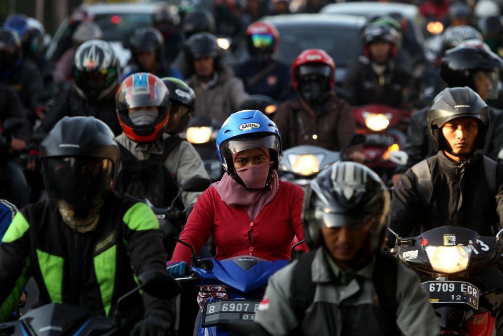 Asia's Motorcycle Boom | Pulitzer Center: 1619 Project